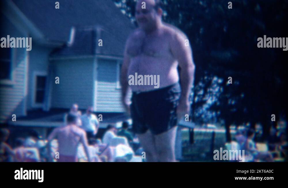 1965: Fat man stunt trick backflips into swimming pool. TAMPA, FLORIDA ...