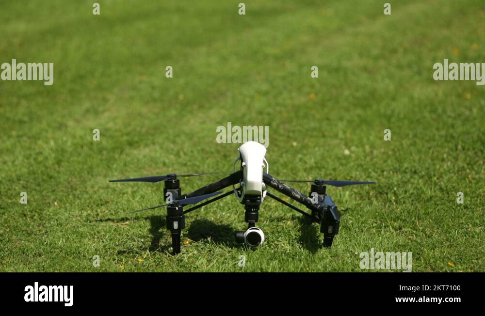 Quadcopter / Drone taking off, landing gear retracting and hovering ...