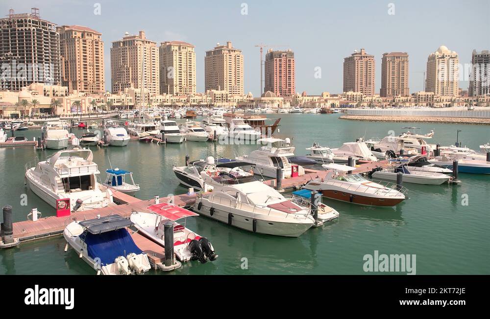 Boats docked in the marina in residential area of The Pearl Qatar ...