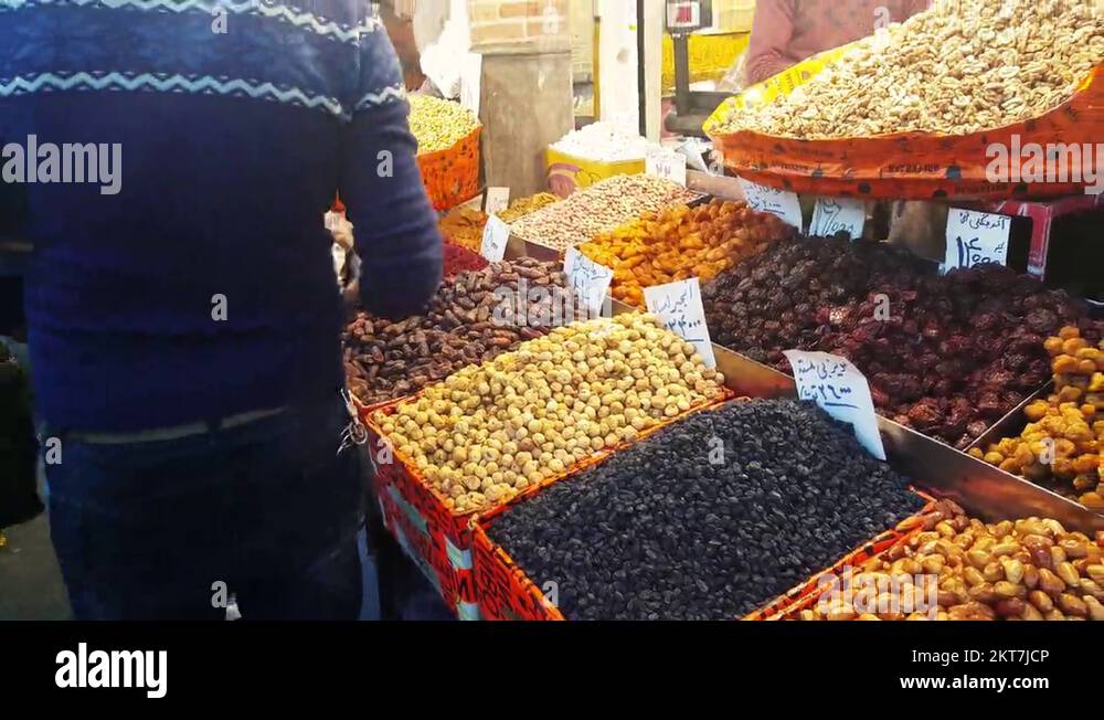 Iran: Crowd of people shopping goods in the old local market Bazaar of ...