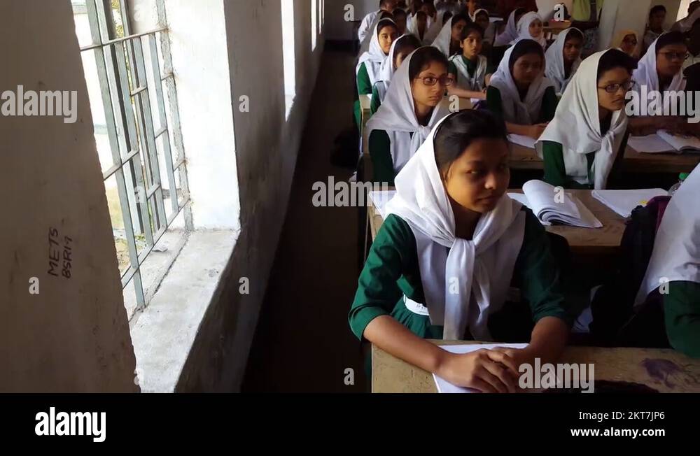 Muslim Bangladeshi students listening to a lecture about mother teresa ...
