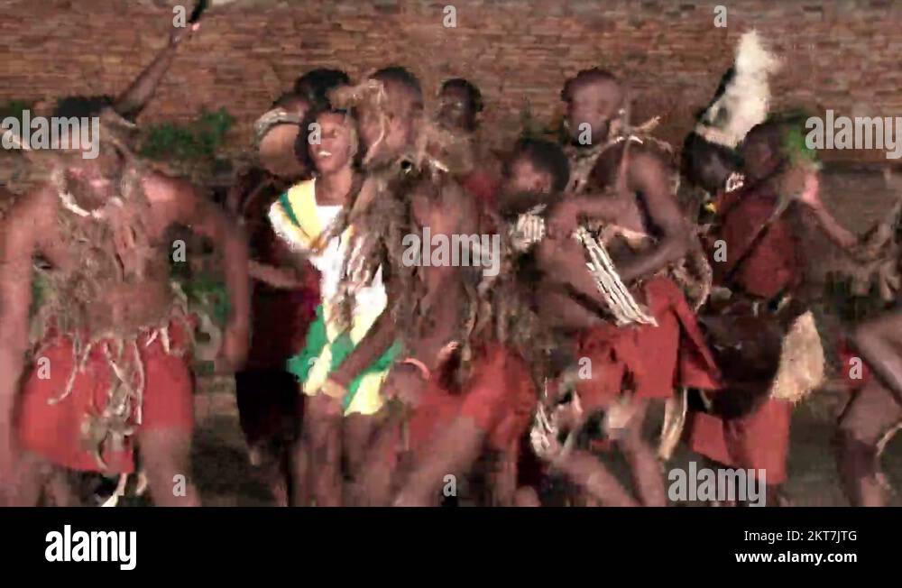 African tribe dancers, tribesmen tribeswomen dance sing songs drum jump ...
