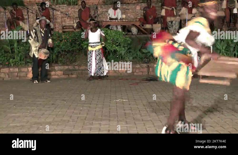 African tribe dancers, tribesmen tribeswomen dance sing songs drum jump ...
