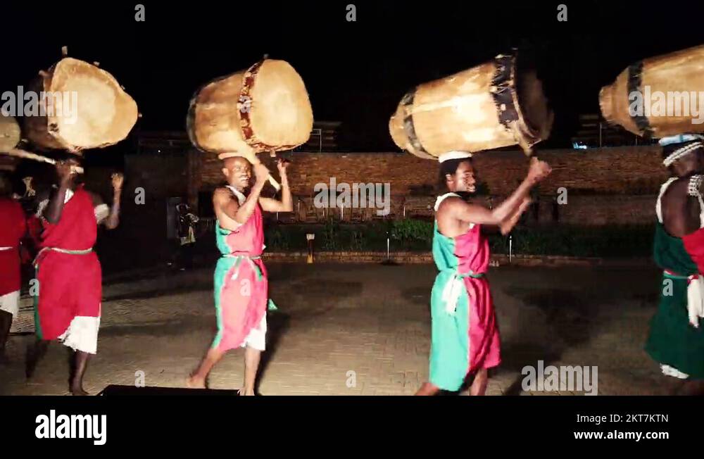 African tribe dancers, tribesmen tribeswomen dance sing songs drum jump ...