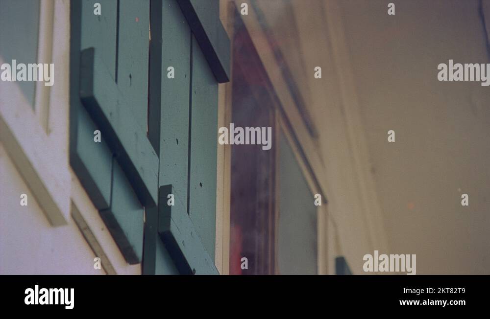 Fire pouring from windows of burning house, seen from below Stock Video ...
