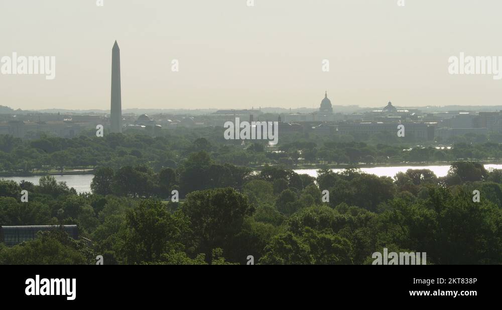 Looking across Potomac River toward DC landmarks in haze, seen from ...