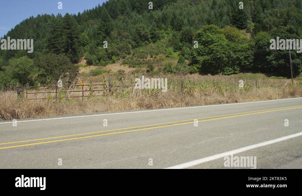 Right Side view of a Driving Plate: Car turns left out of a driveway ...
