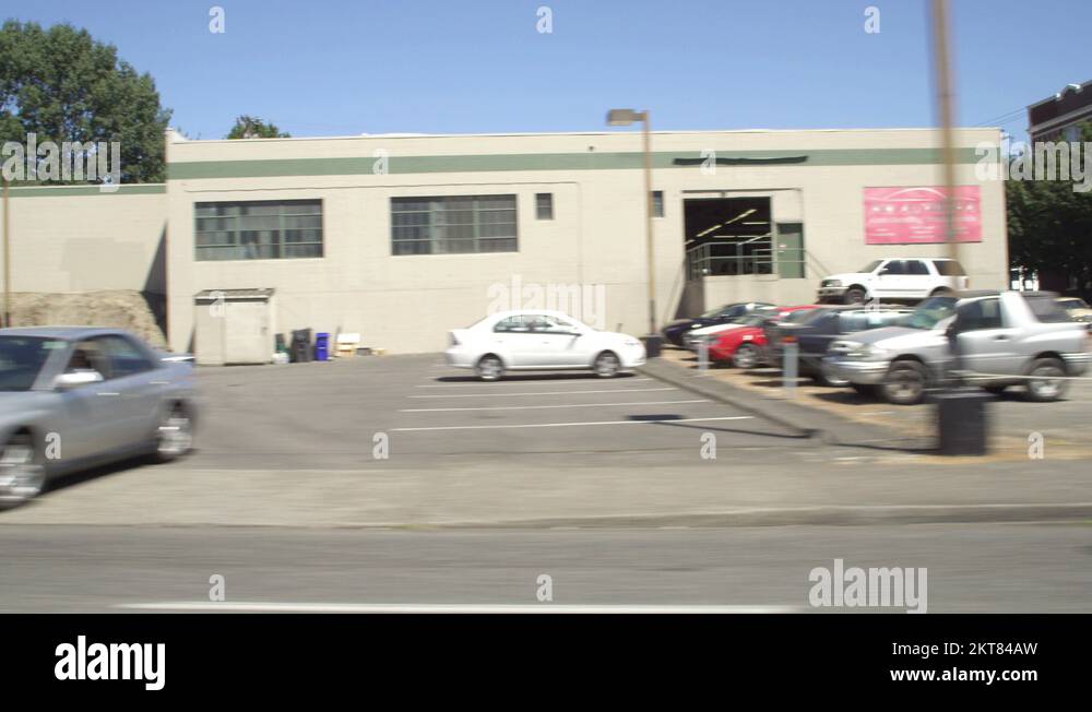 Left Side view of a Driving Plate: Car travels east on West Burnside ...
