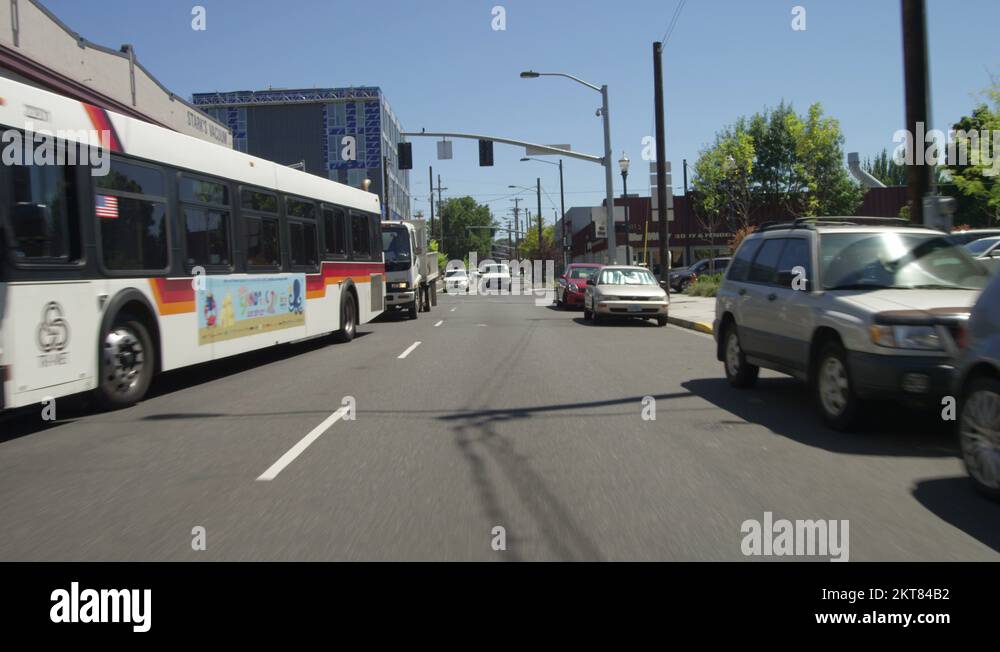 Rear view of a Driving Plate: Car turns left from NE Couch Street in ...
