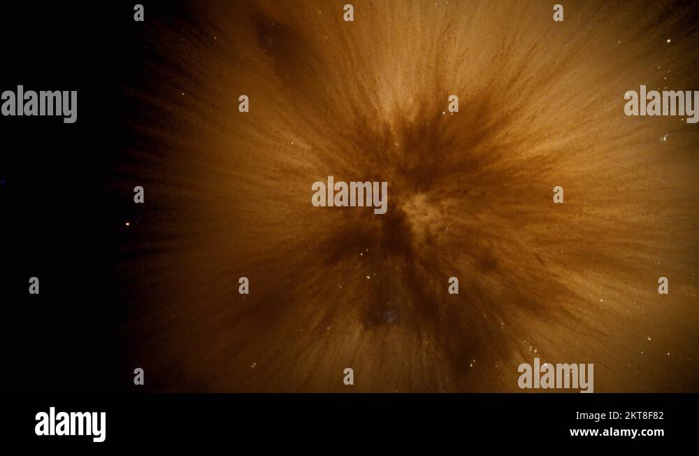 Fiery rays outlining a golden sphere that vanishes in smoke and ...