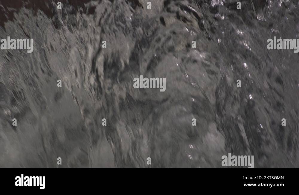 Close-up clear water streaming down section of waterfall Stock Video ...