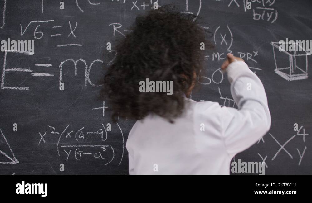 4K Happy little scientist with fake mustache writing math formulas on ...