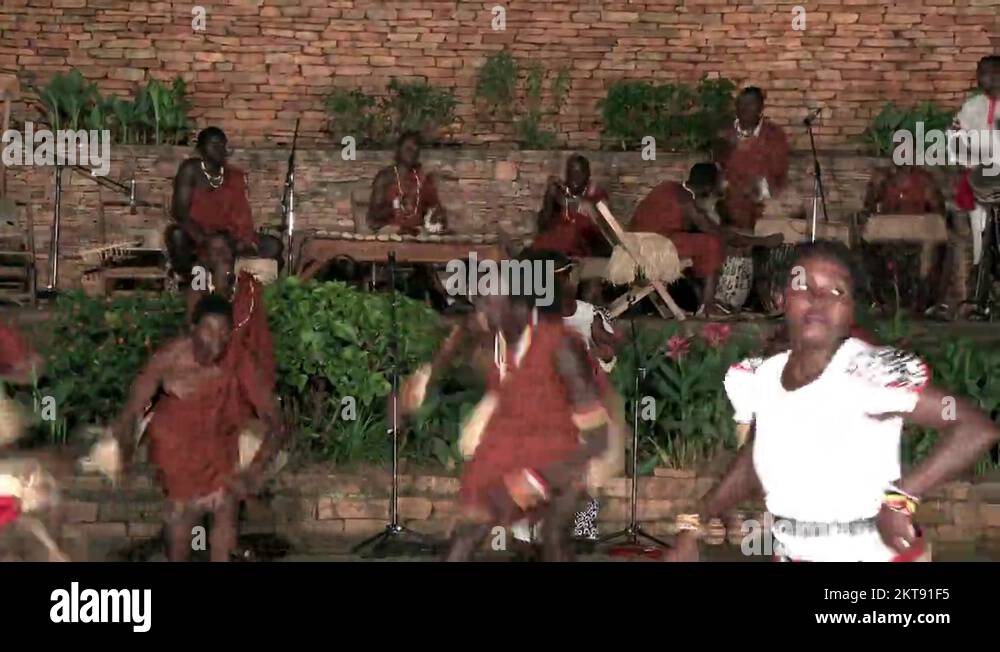 African tribe dancers, tribesmen tribeswomen dance sing songs drum jump ...