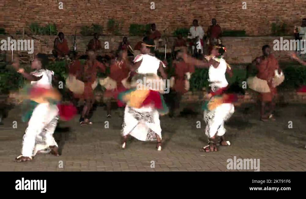 African tribe dancers, tribesmen tribeswomen dance sing songs drum jump ...