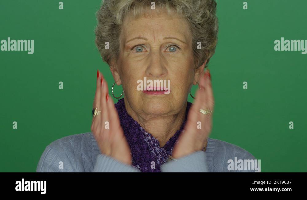 Older Woman Looking Shocked And Appalled On A Green Screen Background