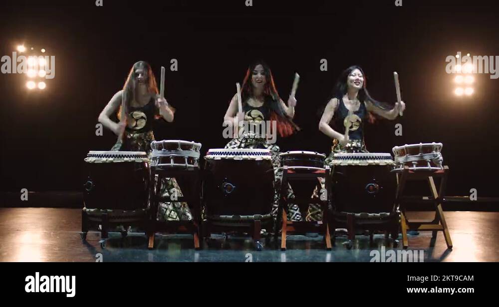 very epic performance of three Japanese Taiko drummer on stage, with ...