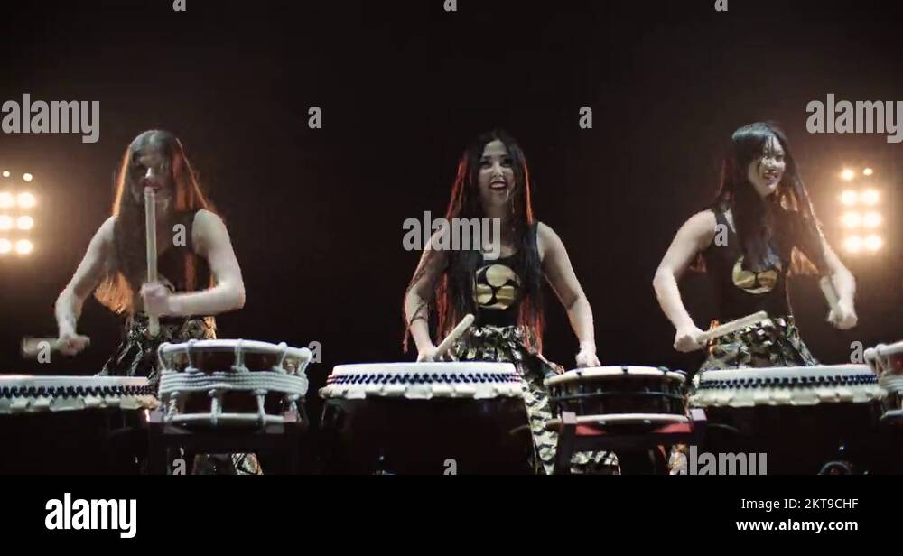 very epic performance of three Japanese Taiko drummer on stage, with ...