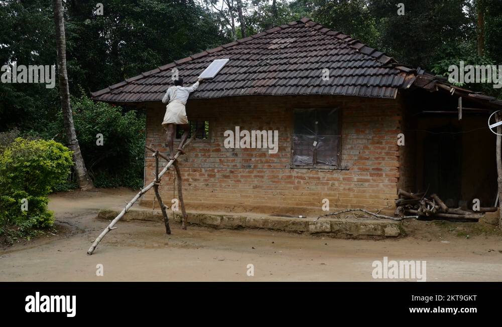 Poor man putting solar panel on his roof Stock Video Footage - Alamy Poor man putting solar panel on his roof Stock Video Footage - Alamy