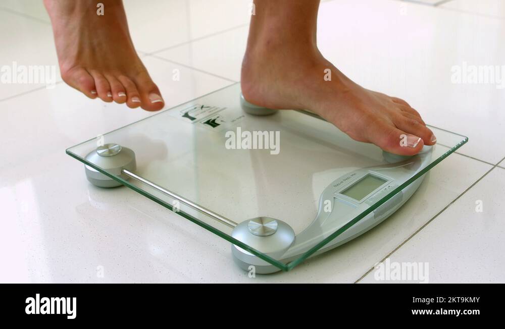 Diet scale feet Stock Videos & Footage - HD and 4K Video Clips - Alamy