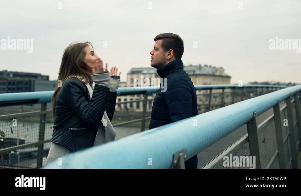 Young couple arguing, fighting on bridge in city Stock Video Footage ...