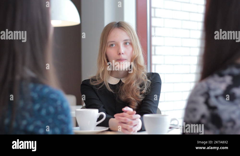 Young girl sitting and talking, good for job interviews and college ...