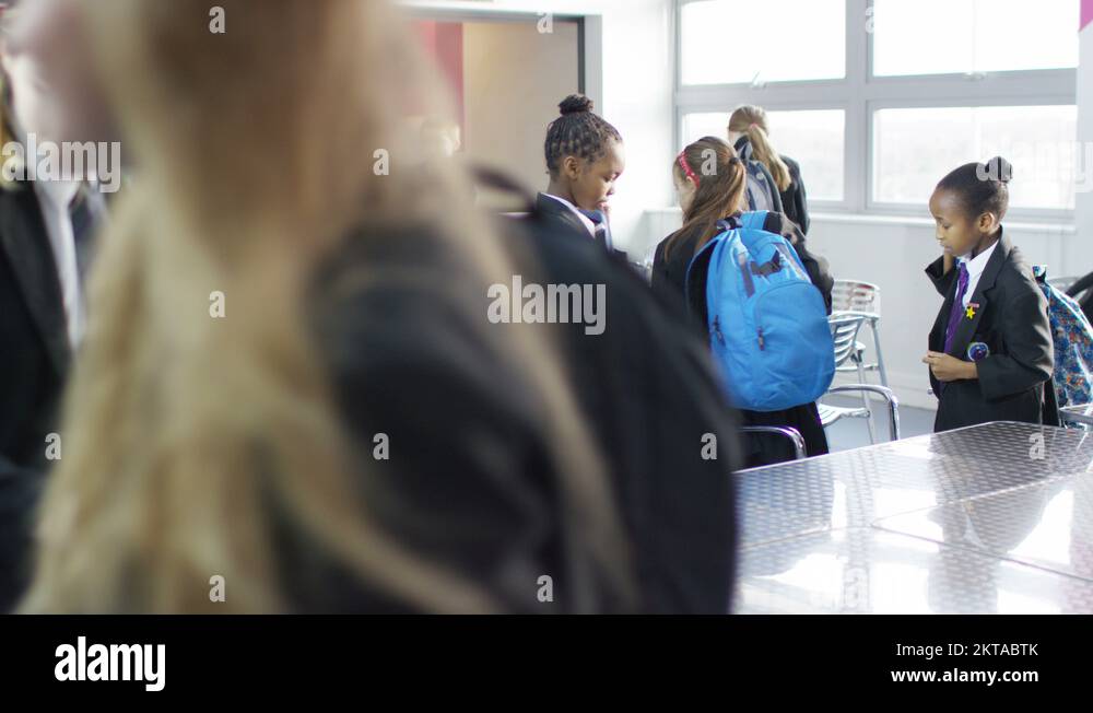 4K Happy group of school children leaving school cafeteria at end of ...