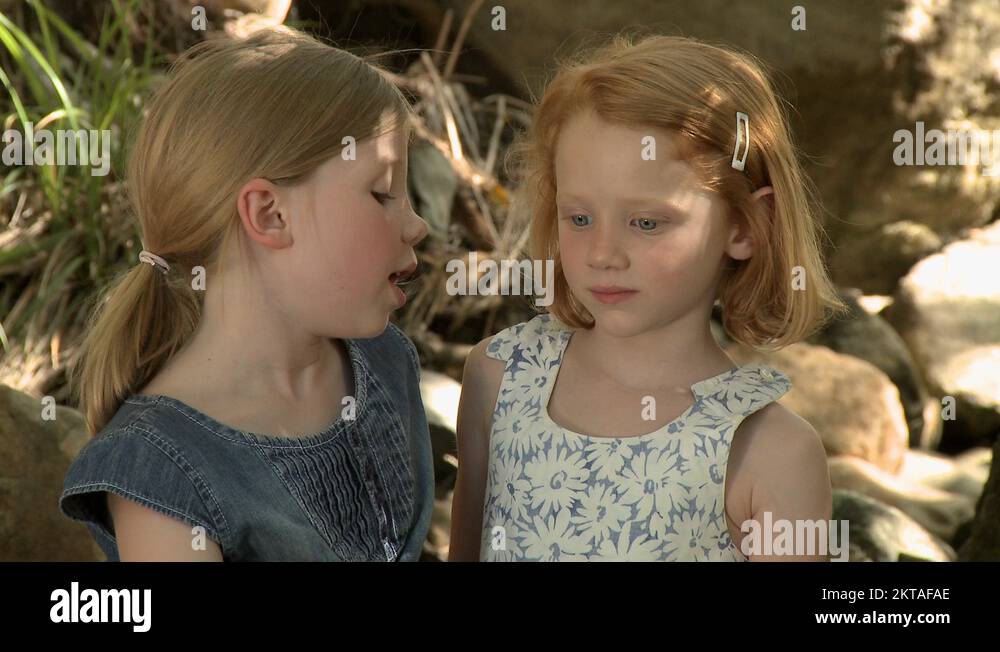 Two girls talking Stock Video Footage - Alamy