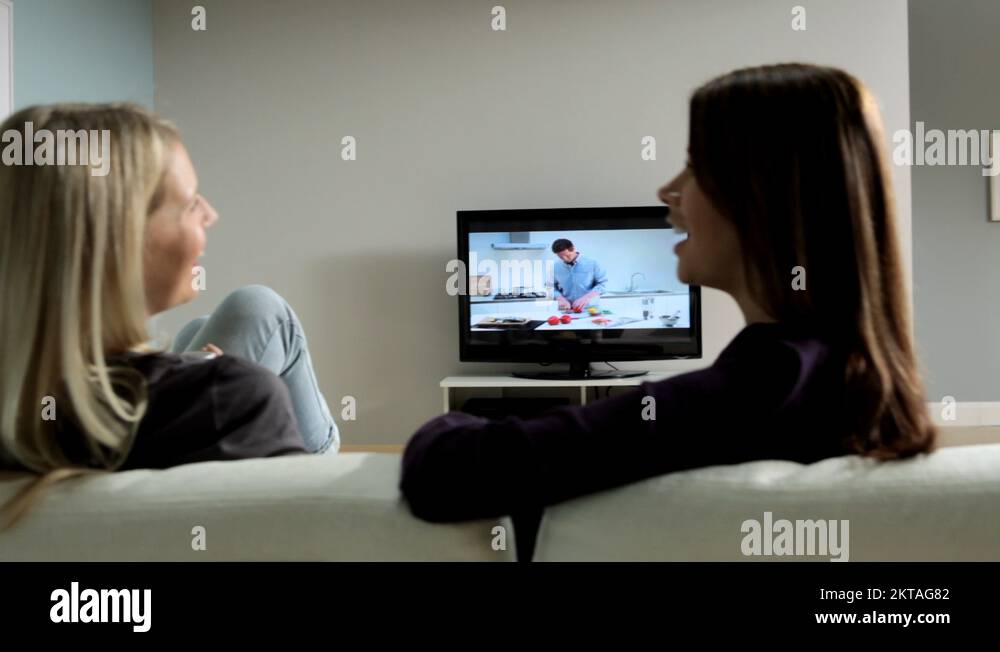 Young women watching tv Stock Videos & Footage - HD and 4K Video Clips ...