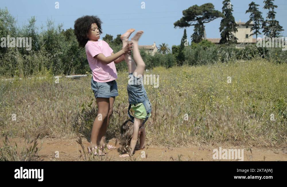 Girl handstand Stock Videos & Footage - HD and 4K Video Clips - Alamy