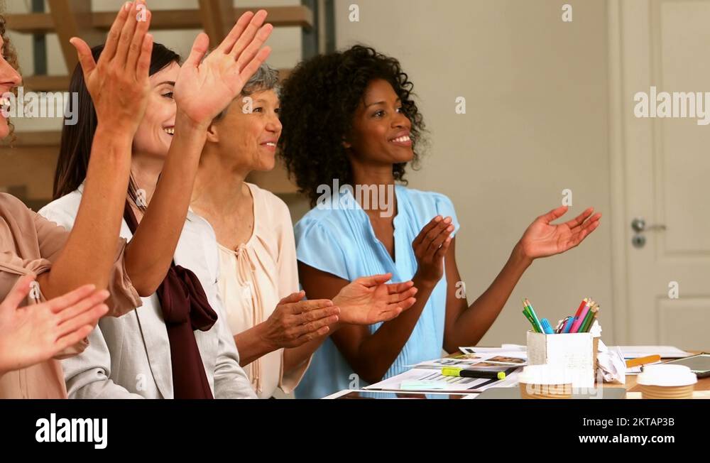 Smiling women clapping hands Stock Video Footage - Alamy