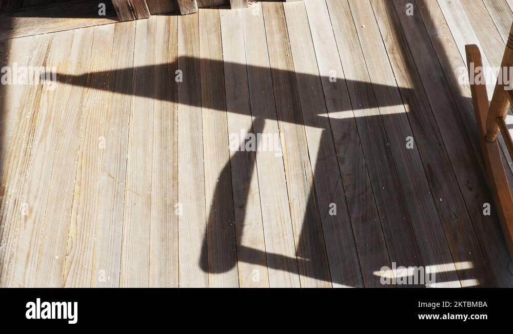 Man Sitting in Wooden Rocking Chair with Shadow, 4K Stock Video Footage ...