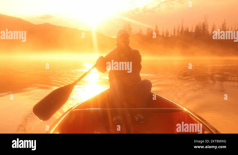 Man rowing canoe Stock Videos & Footage - HD and 4K Video Clips - Alamy