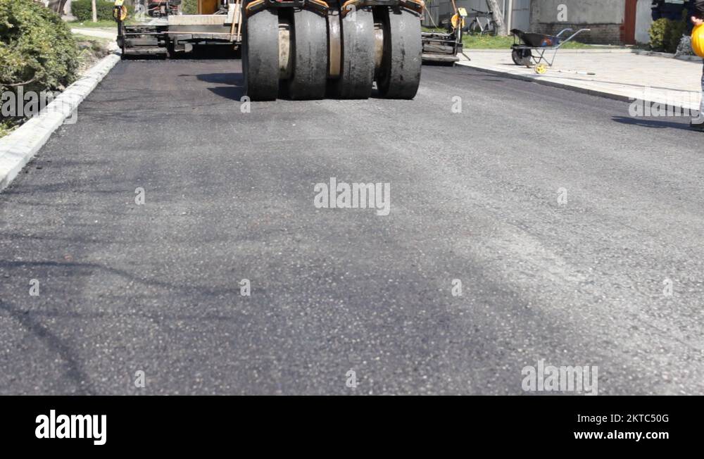 Bitumen paving machine Stock Videos & Footage - HD and 4K Video Clips ...