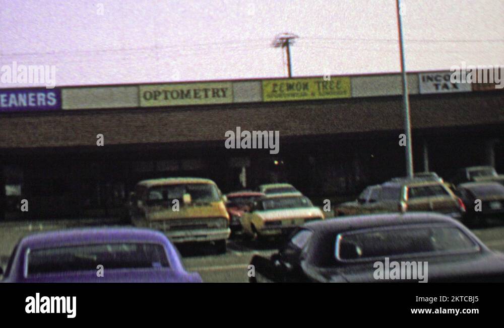 1974: Strip mall parking lot business storefront signs and logos Stock ...