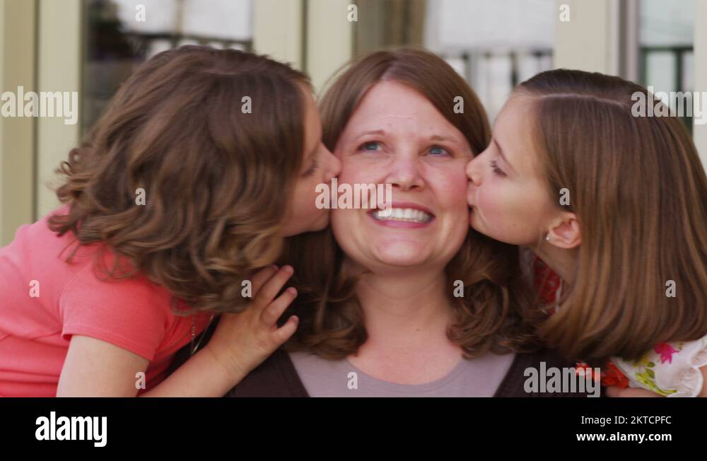 Kiss on cheeks Stock Videos & Footage - HD and 4K Video Clips - Alamy