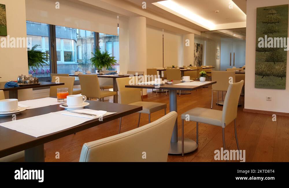 A hotel breakfast room with empty tables, in 4K Stock Video Footage - Alamy