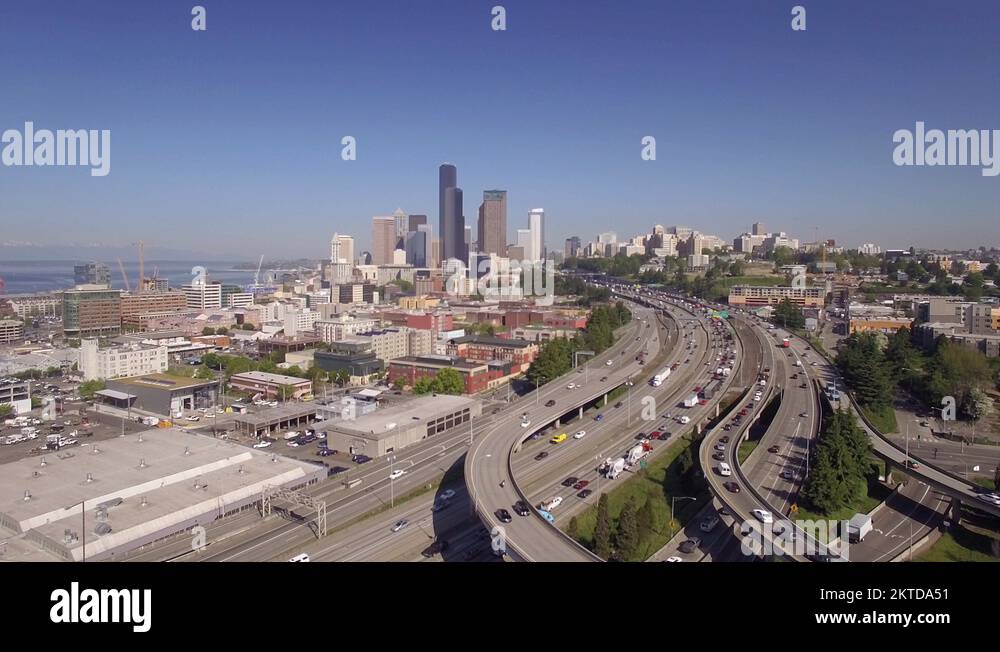 Downtown Seattle Freeway Traffic Aerial with Skyscraper Buildings in ...