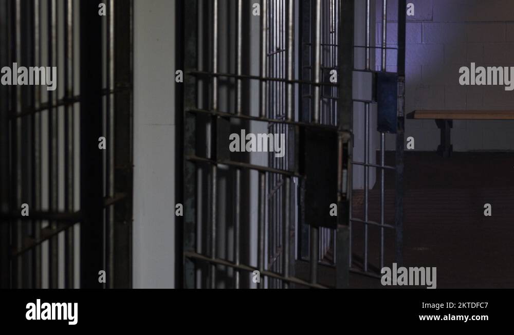 Modern Prison Establishing Shot - Zoom out from cell doors Stock Video ...