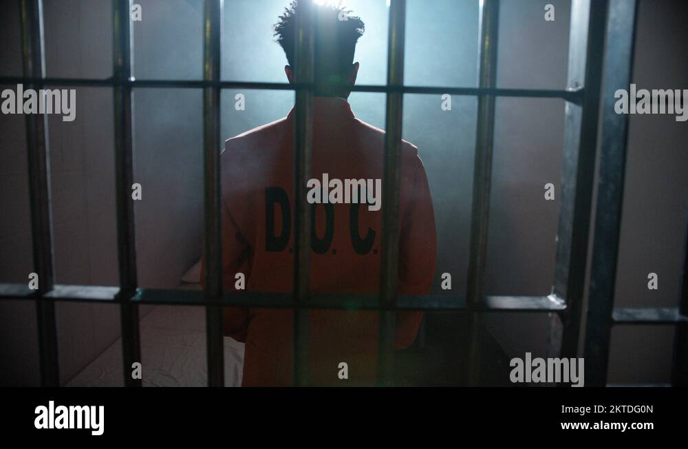Prison cells in Jail - silhouette of inmate Stock Video Footage - Alamy