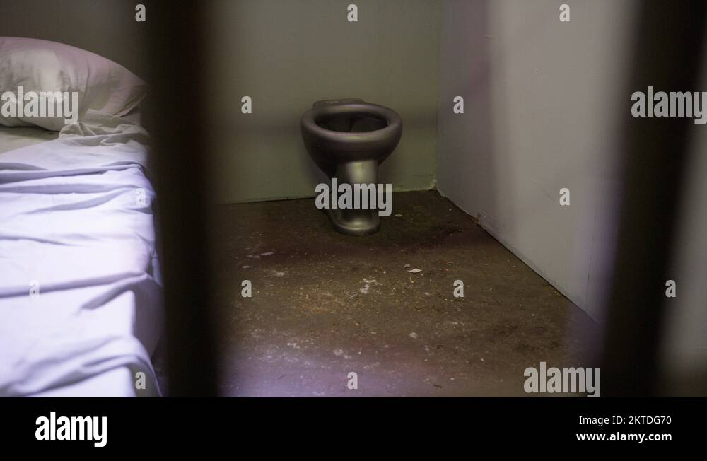 Pan from jail cell bed to toilet - Prison lifestyle Stock Video Footage ...