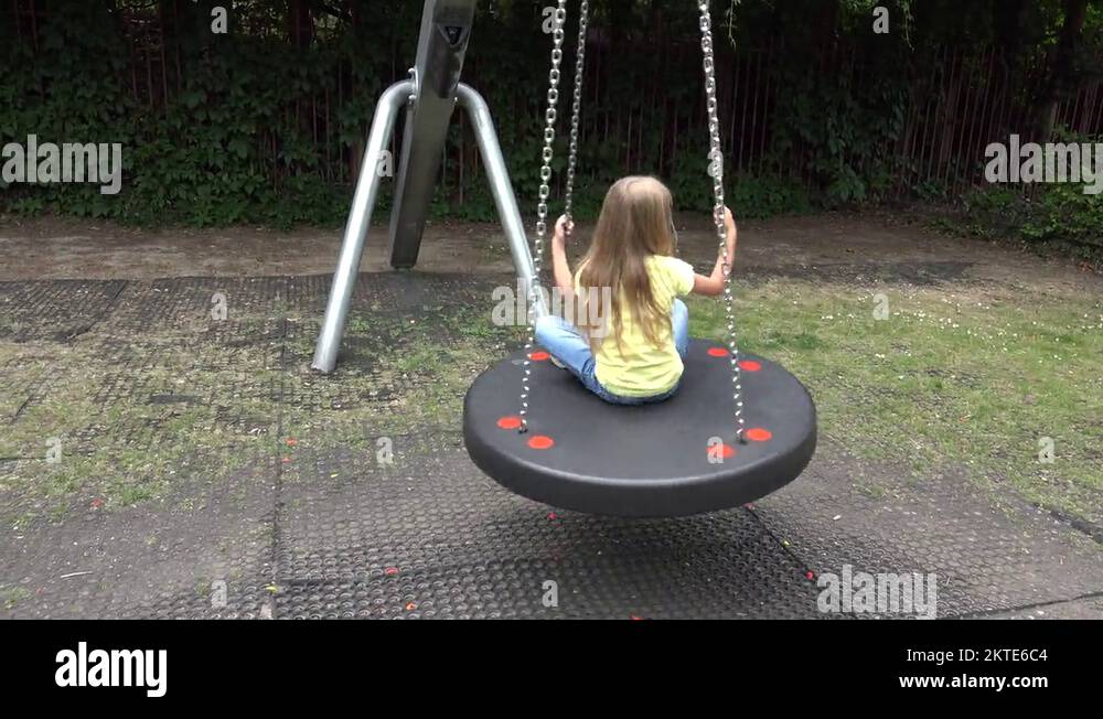 4K Happy Smiley Child Swinging, Little Girl Playing at Playground Park ...