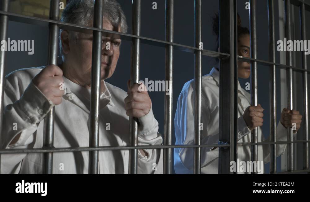 Women prison bars Stock Videos & Footage - HD and 4K Video Clips - Alamy