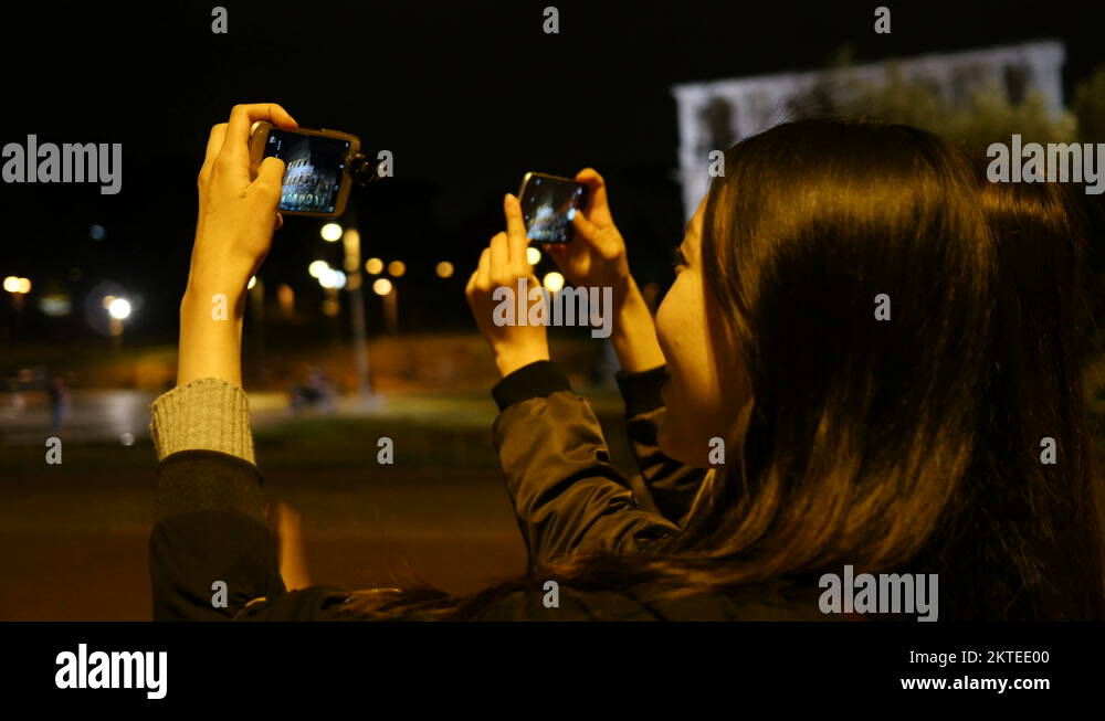 Asean Korean girls visit Colosseum Rome take smart phone photo for ...