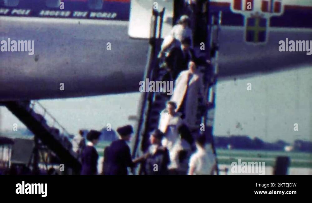 1961: Early 60's style woman deplaning Danish Airlines flight Stock ...