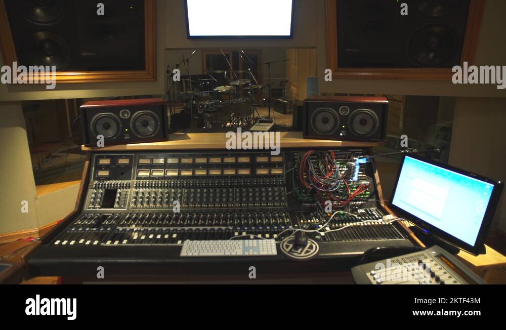 Lights being shut off in the control room of an audio recording studio ...