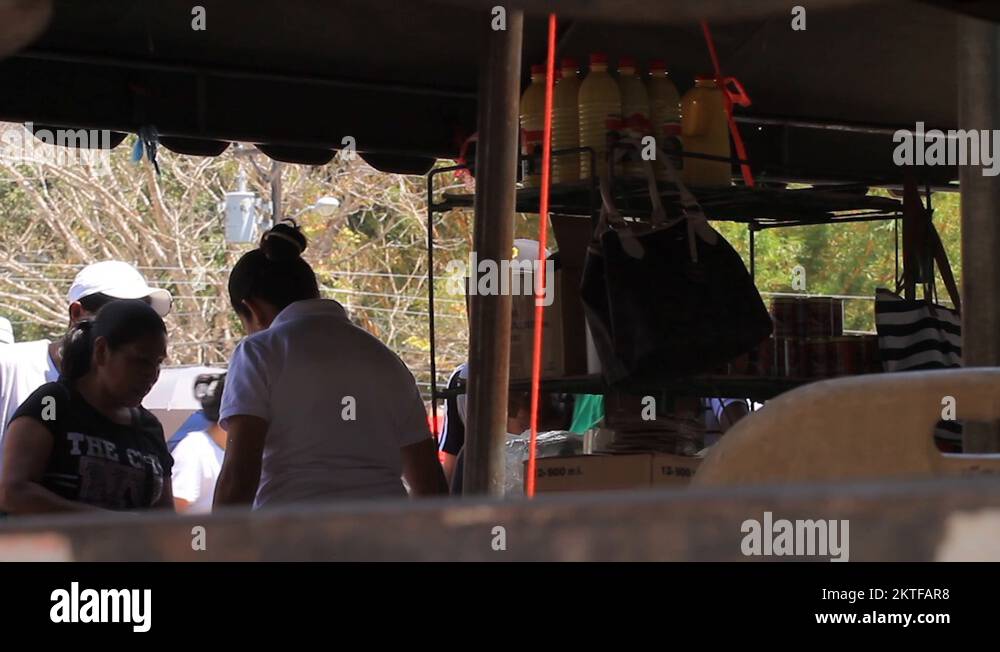 People giving out food during a food drive in Panama Stock Video ...