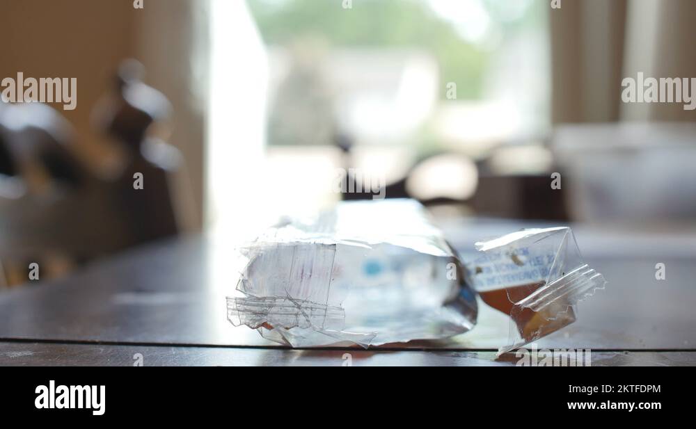 Crumpled wrapper Stock Videos & Footage - HD and 4K Video Clips - Alamy