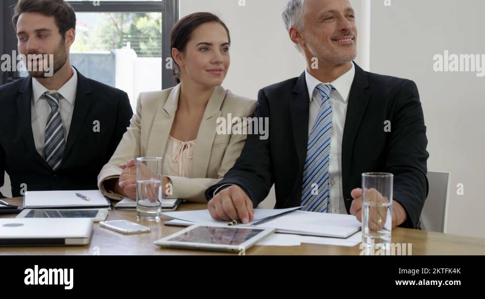 People seated around a table Stock Videos & Footage - HD and 4K Video ...