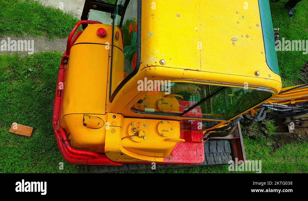 Excavator digging a trench for laying cables Stock Video Footage - Alamy