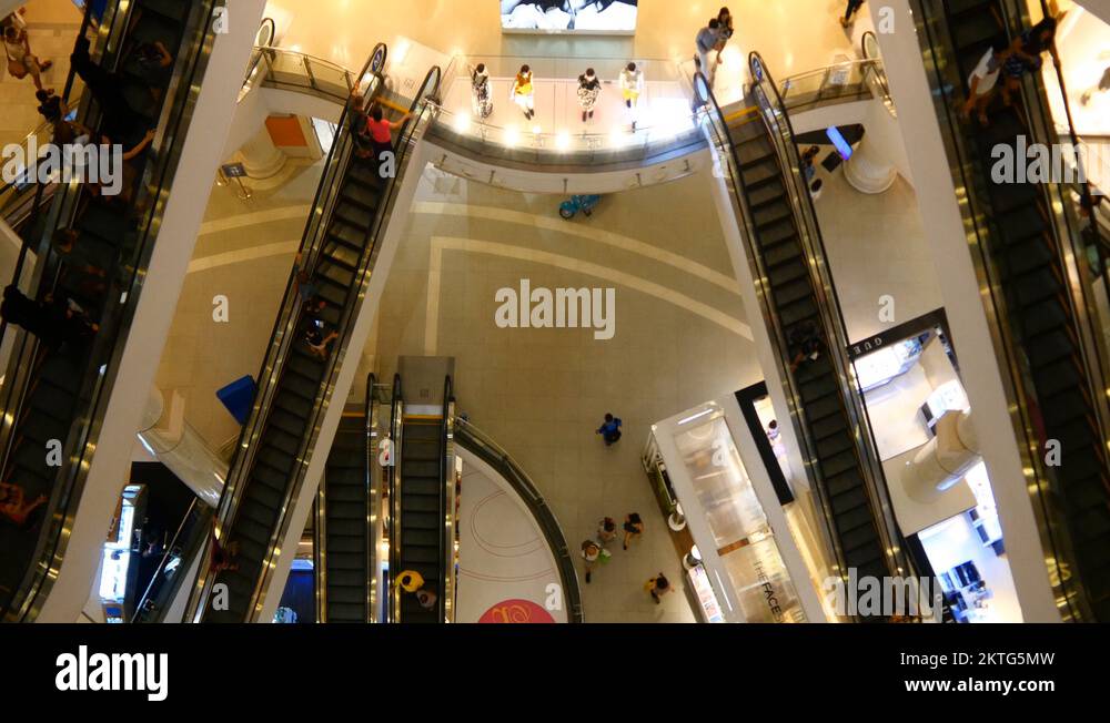 Escalator 4k shopping mall crowd of people buy shop center centre sales shops Stock Video ...